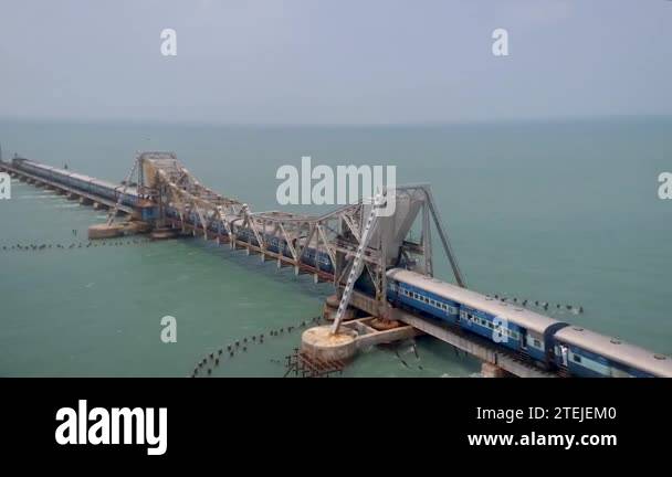 train crossing vintage old bridge over sea from top angle video taken ...