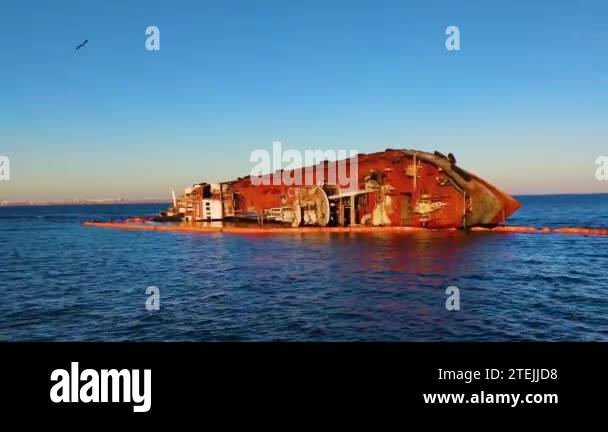 Closeup sunken tanker. Ship through after storm ashore. The tanker lies ...