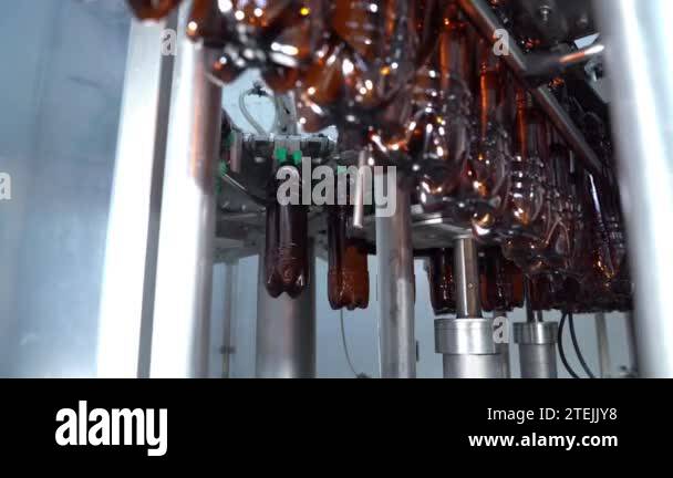 Alcohol factory. Technological line for bottling of beer in brewery ...