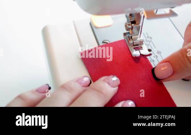 The process of preparing fabric parts for sewing on a sewing machine ...