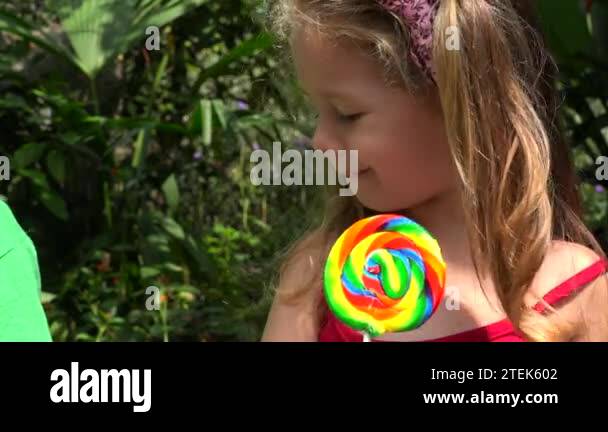 Young girl eating lolly Stock Videos & Footage - HD and 4K Video Clips ...