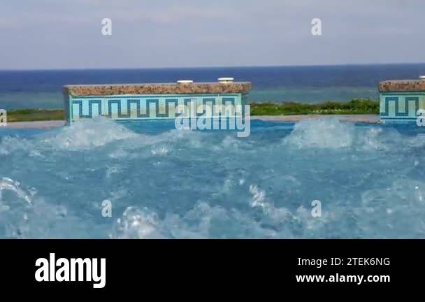 jacuzzi. close-up. bubbling water in the open jacuzzi, pool. tropical ...