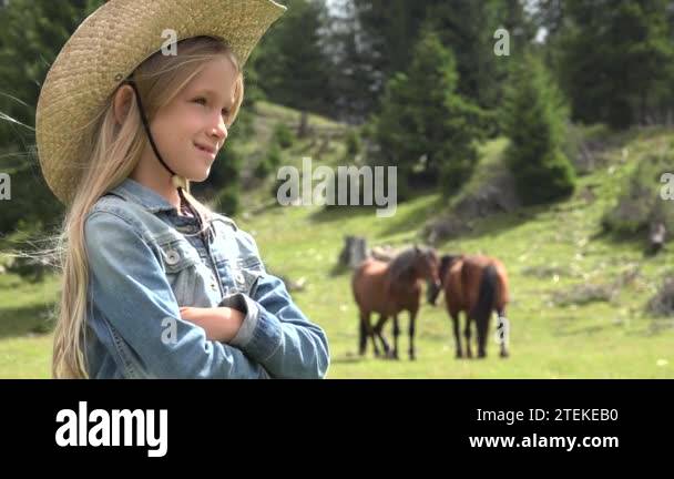 Farmer Child Pasturing Horses, Cowboy Kid with Animals on Meadow ...