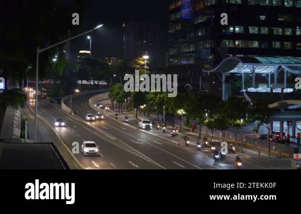 JAKARTA, INDONESIA - CIRCA 2020: jakarta city night time illuminated famous busy traffic street ...
