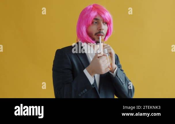 Man pink wig Stock Videos & Footage - HD and 4K Video Clips - Alamy