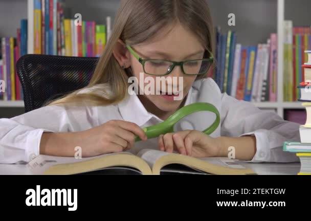 Kid Learning in Class, School Child Reading Book, Studying at Library ...