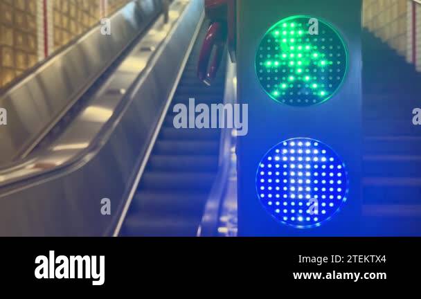Escalator with two directions, LED symbols indicate if the escalator ...