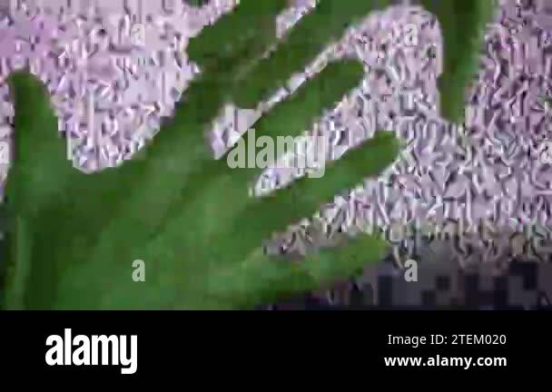 Two Crawling Green Hands Slide by the Screen of an Old TV That Has No ...