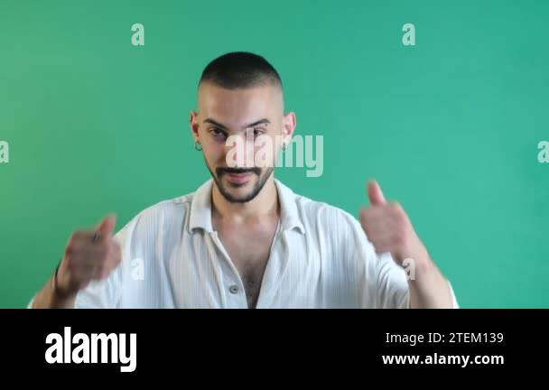 Man doing like sign, young man making a like sign with both hands, show ...