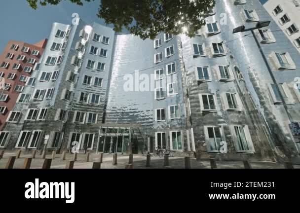 DUSSELDORF, GERMANY - 1 July 2021: Famous shiny metal building of Neuer ...