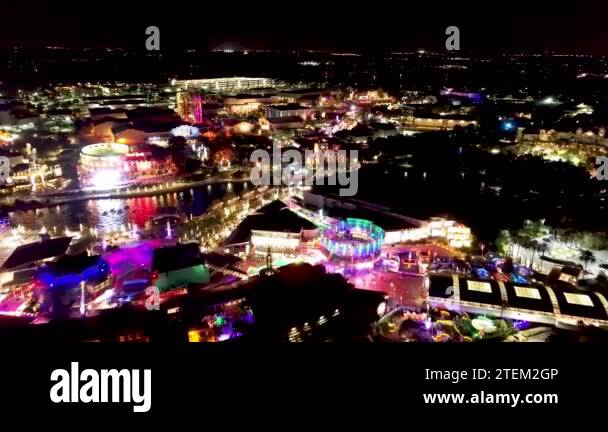 Night landscape of colorful attraction at amusement park at downtown ...