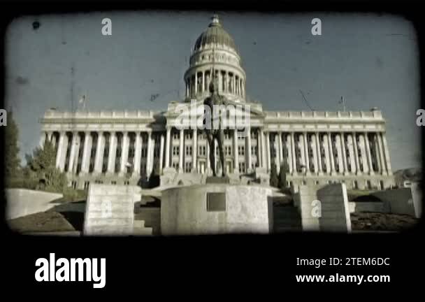 Wide shot of Utah Capitol building from the front with pillars and ...