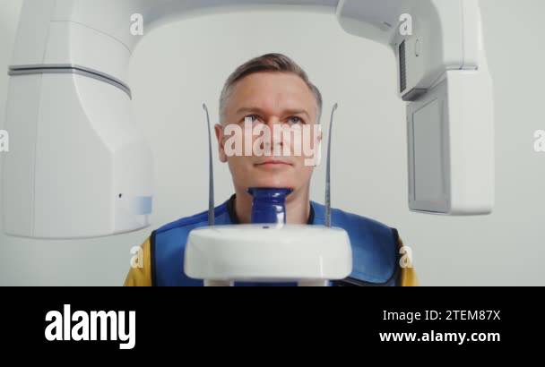 Dental jaw scanning. Patient inside a panoramic 3D dental scanne Stock ...