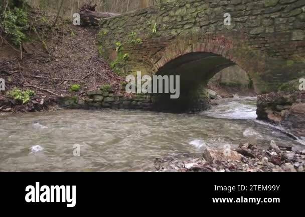 Damaged bridge shows broken bridge after heavy rainfall and extreme ...