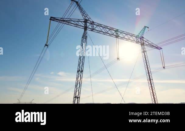 High voltage tower with electric power lines transfening electrical ...