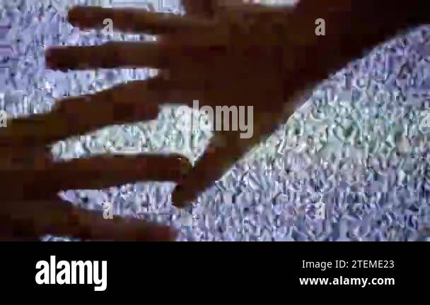 Two Crawling Hands Slide by the Screen of an Old TV That Has No Signal ...