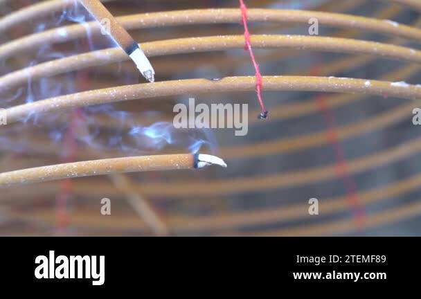 Burned coil swirl incense in Macau (Macao) temple, traditional Chinese ...