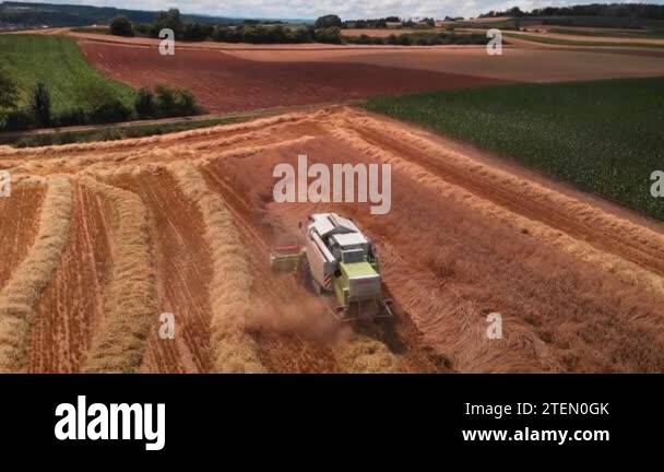 Farmer driving combine harvester Stock Videos & Footage - HD and 4K ...