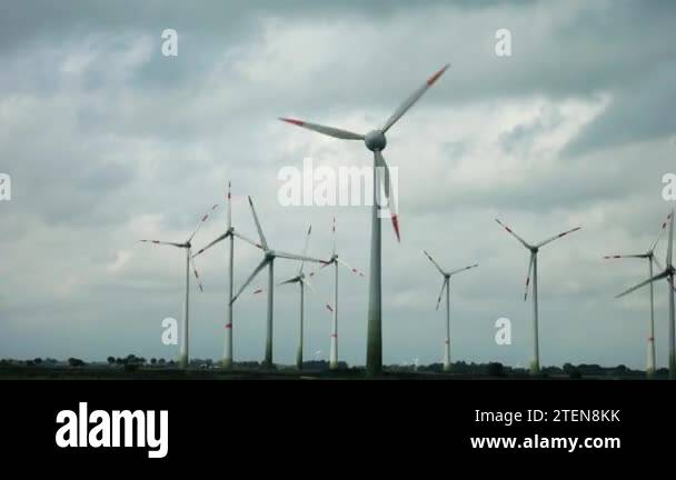 Wind turbine on sky background. Dismounted from a car Wind Turbines Energy Production. Germany ...