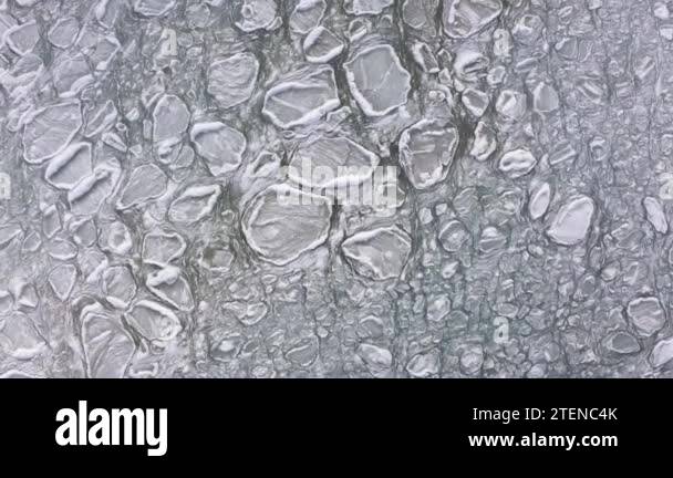 Winter day frozen sea top view on sea water ice texture. The sea froze ...