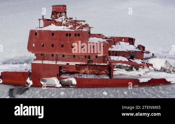 A cargo ship was thrown ashore during a sea storm. In winter, a large ...