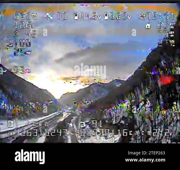 Digital crash effect on the camera from a drone with a view of green ...