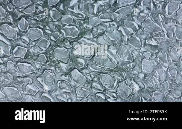 Winter day frozen sea top view on sea water ice texture. The sea froze ...