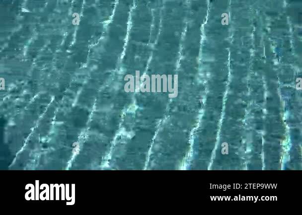 Water surface texture, Slow motion looping clean swimming pool ripples ...
