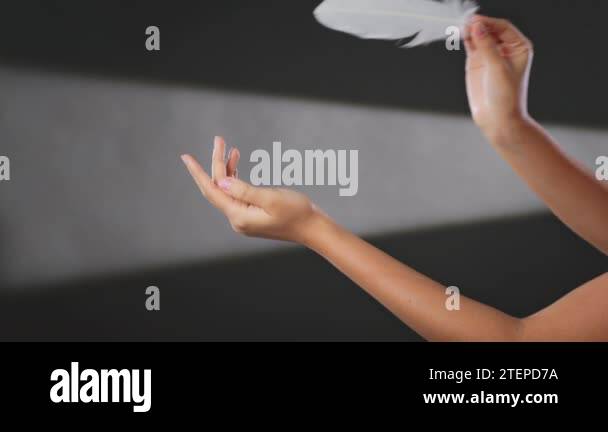 Woman hand white feather Stock Videos & Footage - HD and 4K Video Clips ...