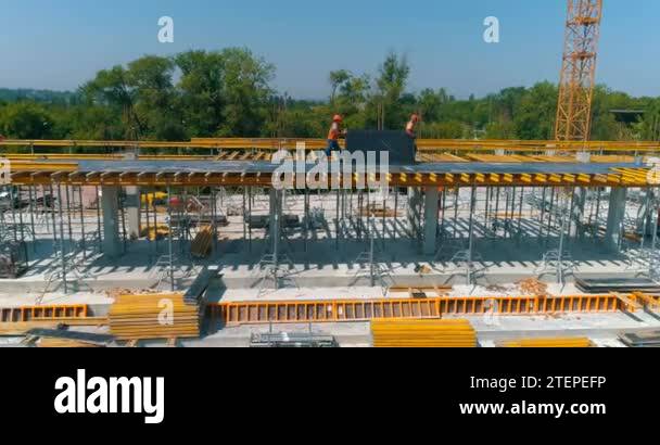 Construction process of a modern football stadium. Builders make ...