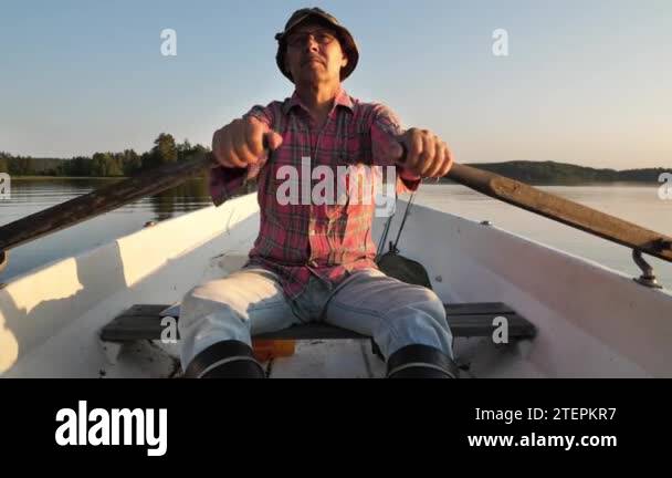 Fisherman goes fishing rowing boat Stock Videos & Footage - HD and 4K ...