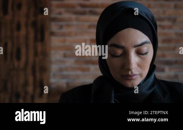 Young Serious And Upset Muslim Woman In Hijab Having Problem And Stress