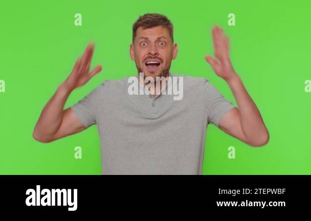 Angry sad young man screams from stress tension problems feels horror ...