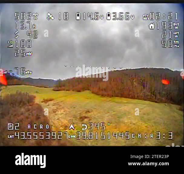 Digital crash effect on the camera from a drone with a view of green ...