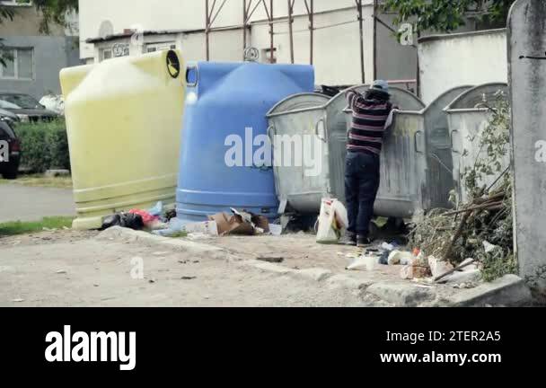 Poor man looking in garbage Stock Videos & Footage - HD and 4K Video ...