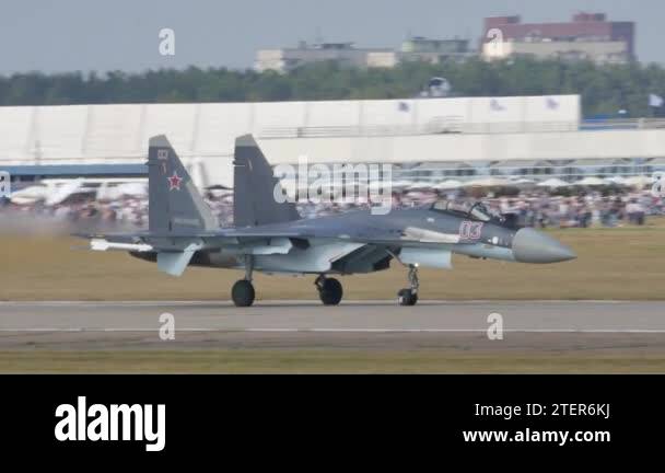Grey combat jet aircraft take off. Sukhoi Su-35 of Russian Air Force ...
