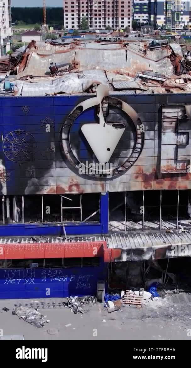 This stock vertical video shows a destroyed building of a shopping ...