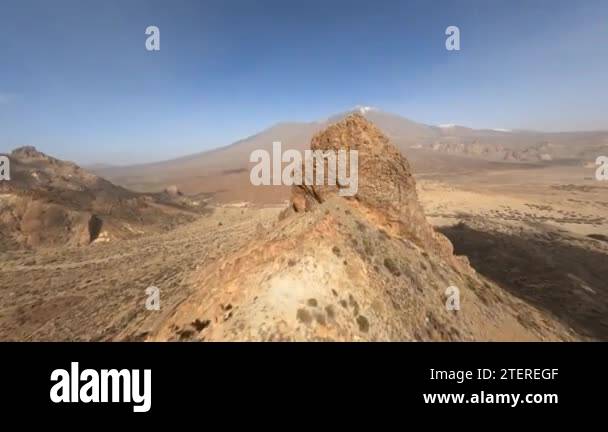 Cliff rock and mountain surfing with a FPV drone in a desert and moon ...