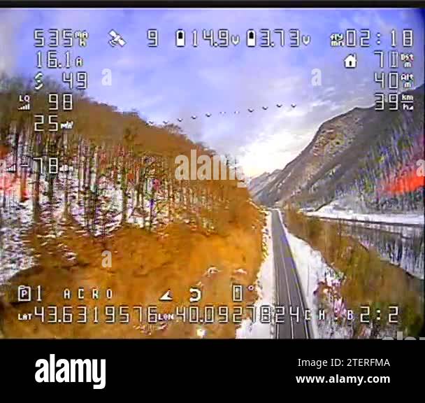 Digital crash effect on the camera from a drone with a view of green ...