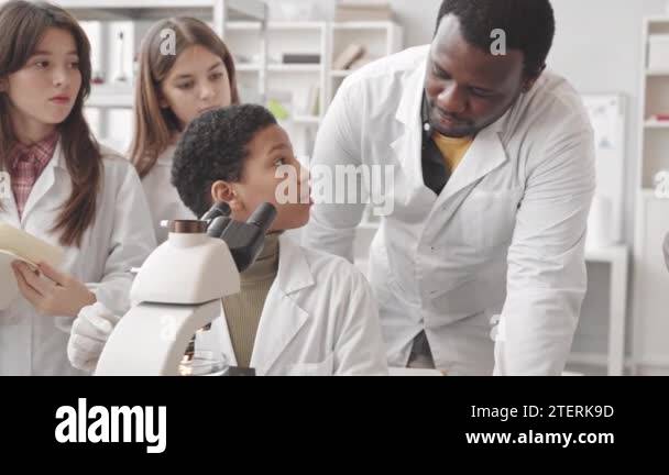 Pupil using microscope Stock Videos & Footage - HD and 4K Video Clips ...