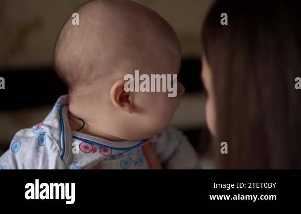 Newborn Baby With Young Mom look Into Each Other Eye. Cute Smiling ...