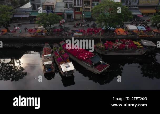 Vietnamese Lunar New Year floating flower market in Ho Chi Minh City is ...