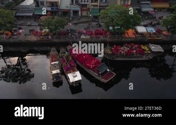 Vietnamese Lunar New Year floating flower market in Ho Chi Minh City is ...