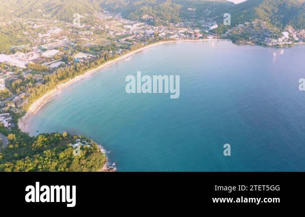 Areal drone top down view of curves of coastal road Phuket Thailand ...