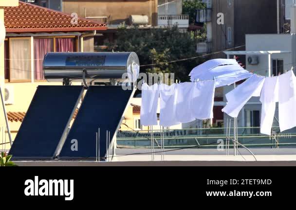 Ksamil, Albania A solar panel and laundry drying on a rooftop Stock ...