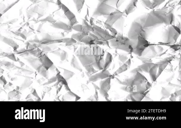 Stop Motion video with crumpled paper with notes and drawings. The ...