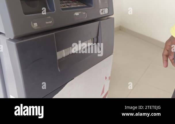 ATM Cash withdrawal - Indian rupees in ATM. Man withdrawing the cash ...
