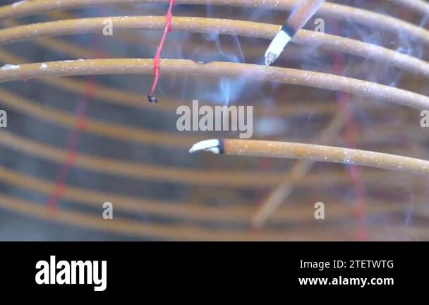Burned coil swirl incense in Macau (Macao) temple, traditional Chinese ...