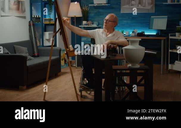 Paralyzed man with health condition drawing modern art model of ...