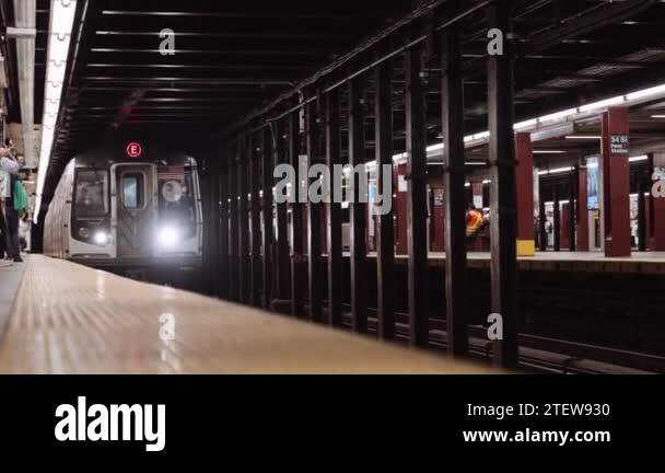 Subway Train with Headlights On and American National Flag on the ...
